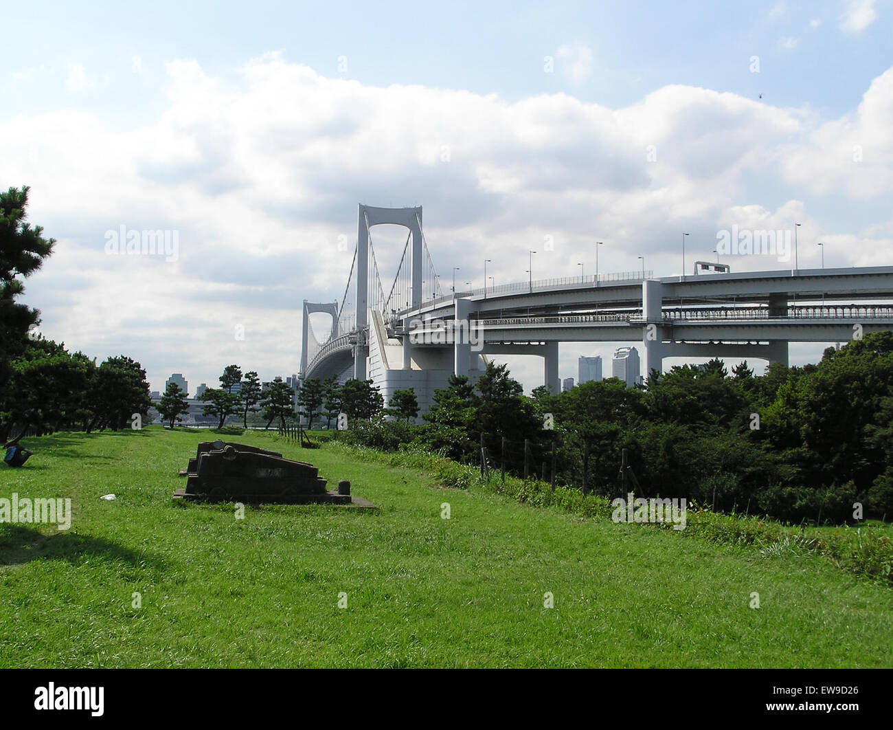 The Rainbow Bridge, spanning Tokyo Harbor, is an iconic suspension ...