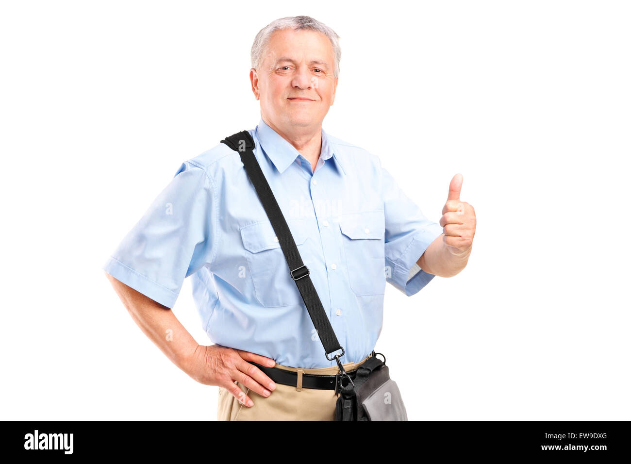 Mature mailman giving a thumb up isolated on white background Stock ...