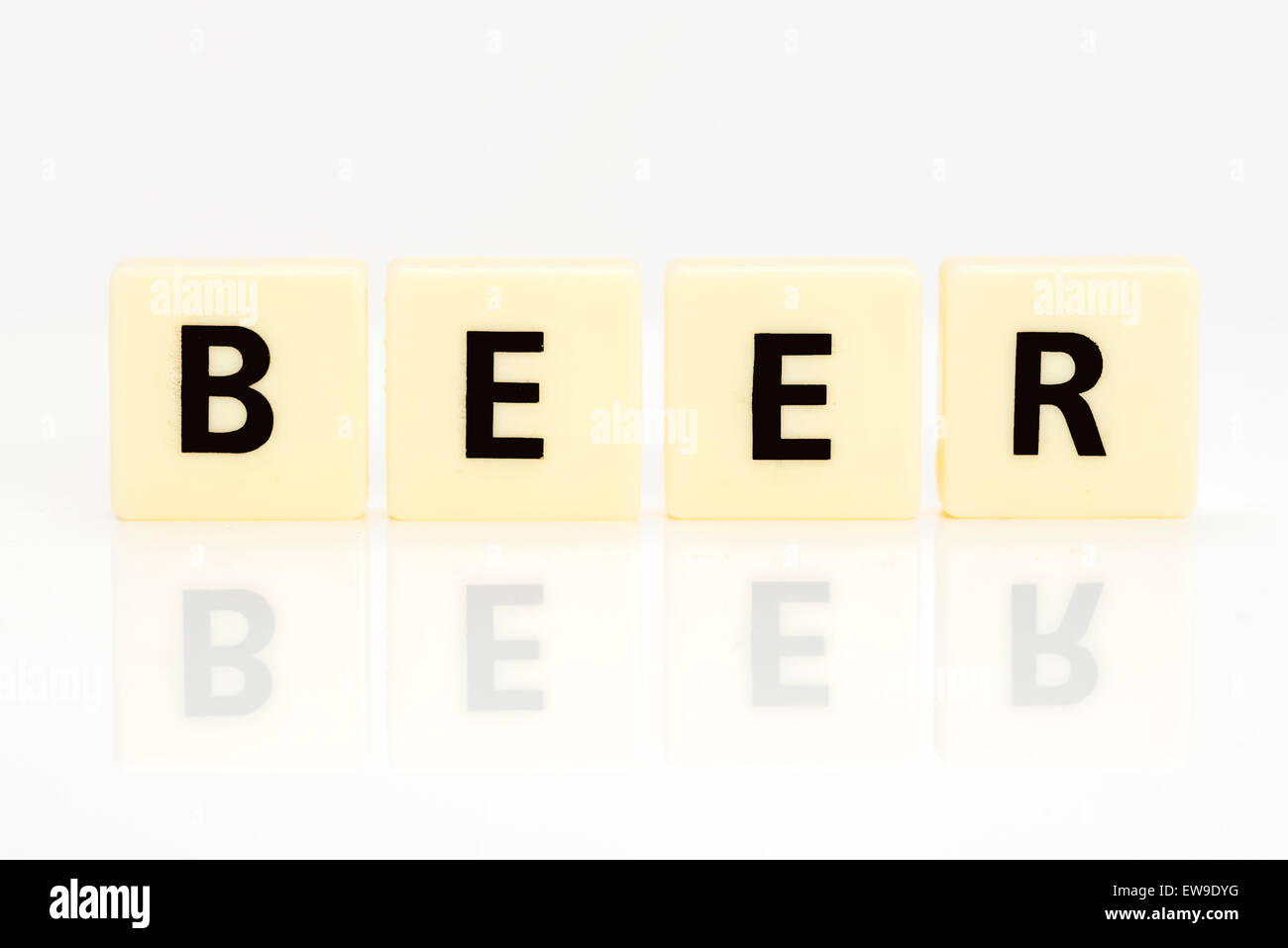 Generic letter tiles on a white background with reflection spelling the ...