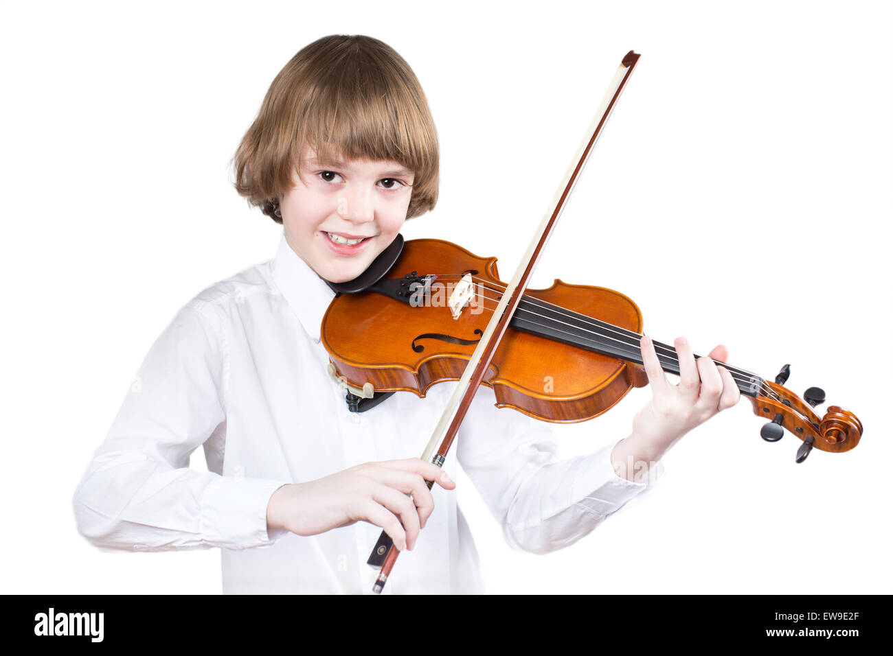 Happy child playing violin Stock Photo - Alamy