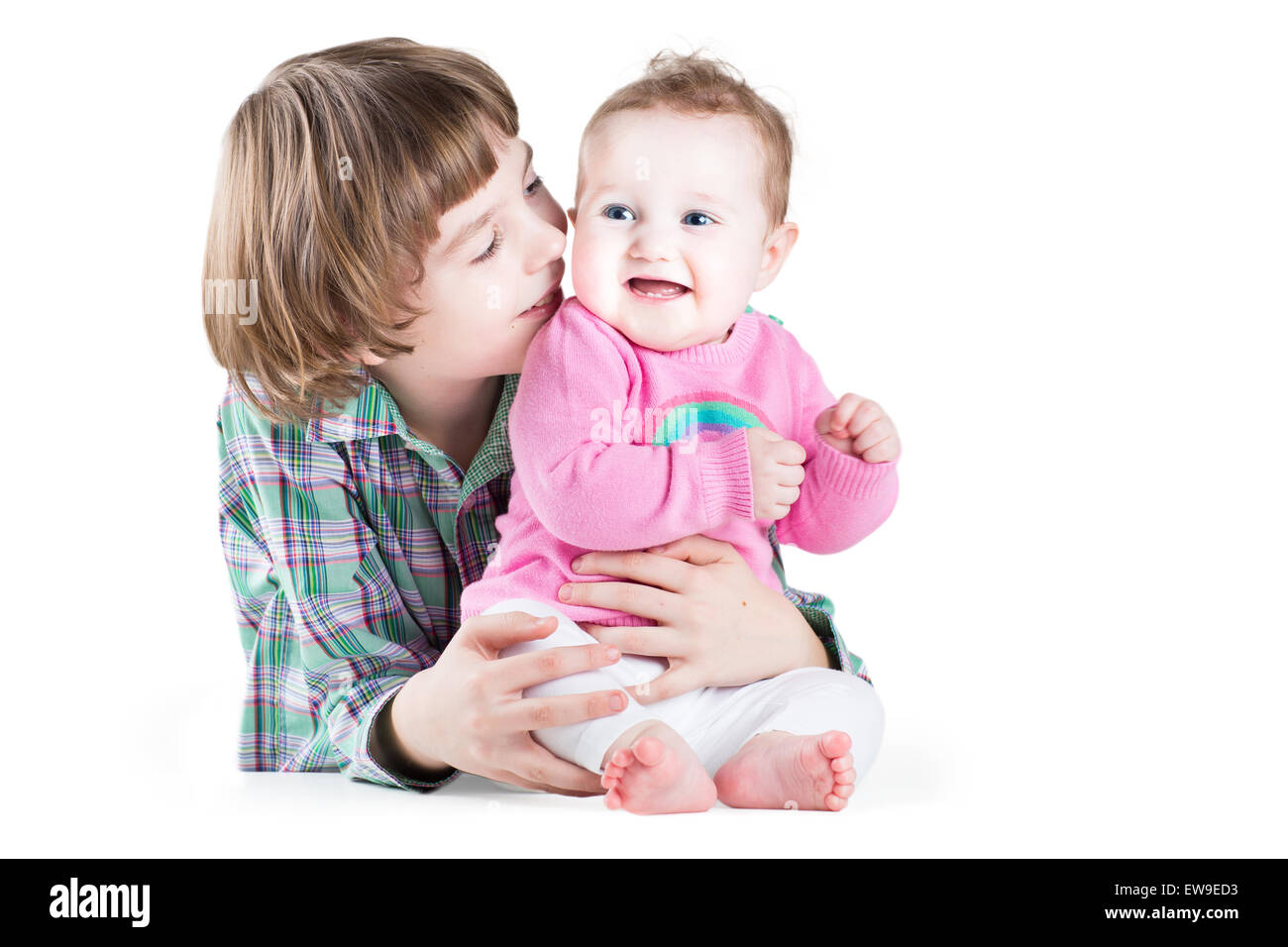 Two happy siblings playing together Stock Photo - Alamy