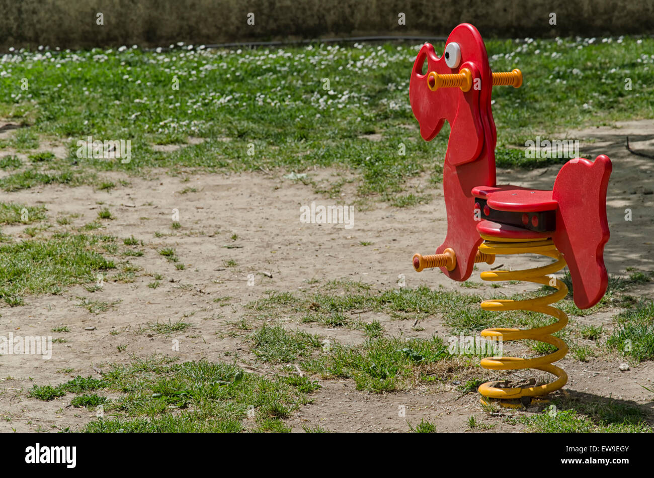 View of rocking horse in a park Stock Photo - Alamy