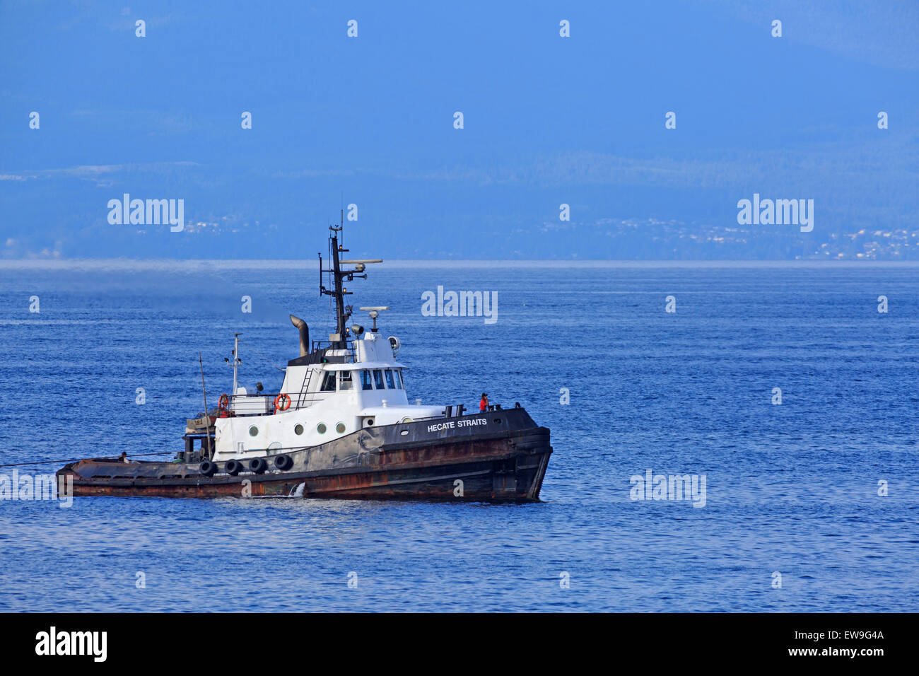 Tugboat pulling log boom in Georgia Strait, just north of Nanaimo ...