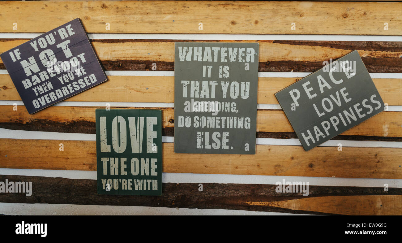 Signs with motivation words on rustic wood Stock Photo - Alamy