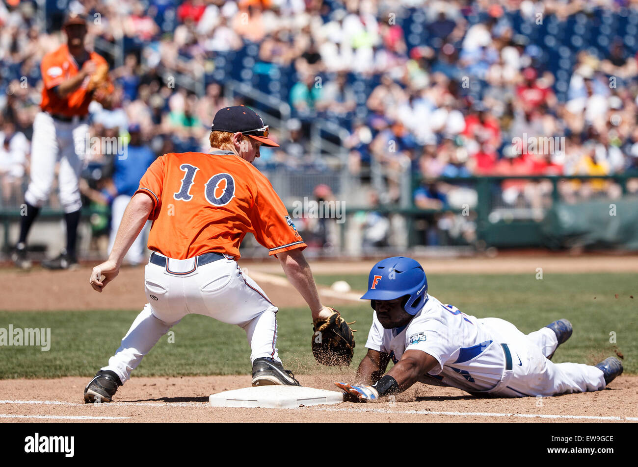 June 19, 2015: Florida's Josh Tobias #11 slides safely back to 1st base ...
