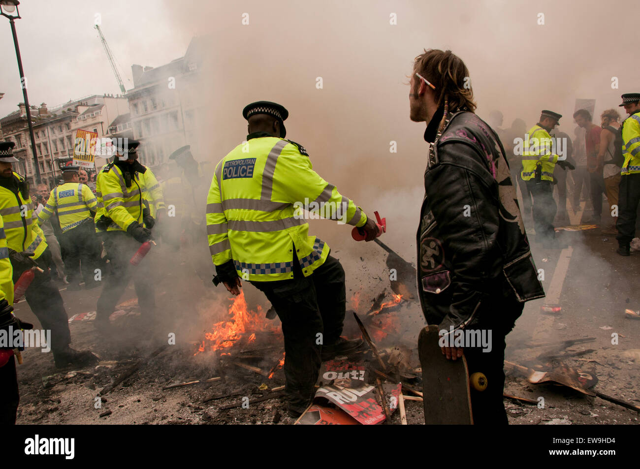 Police putting out fire burning hi-res stock photography and images - Alamy
