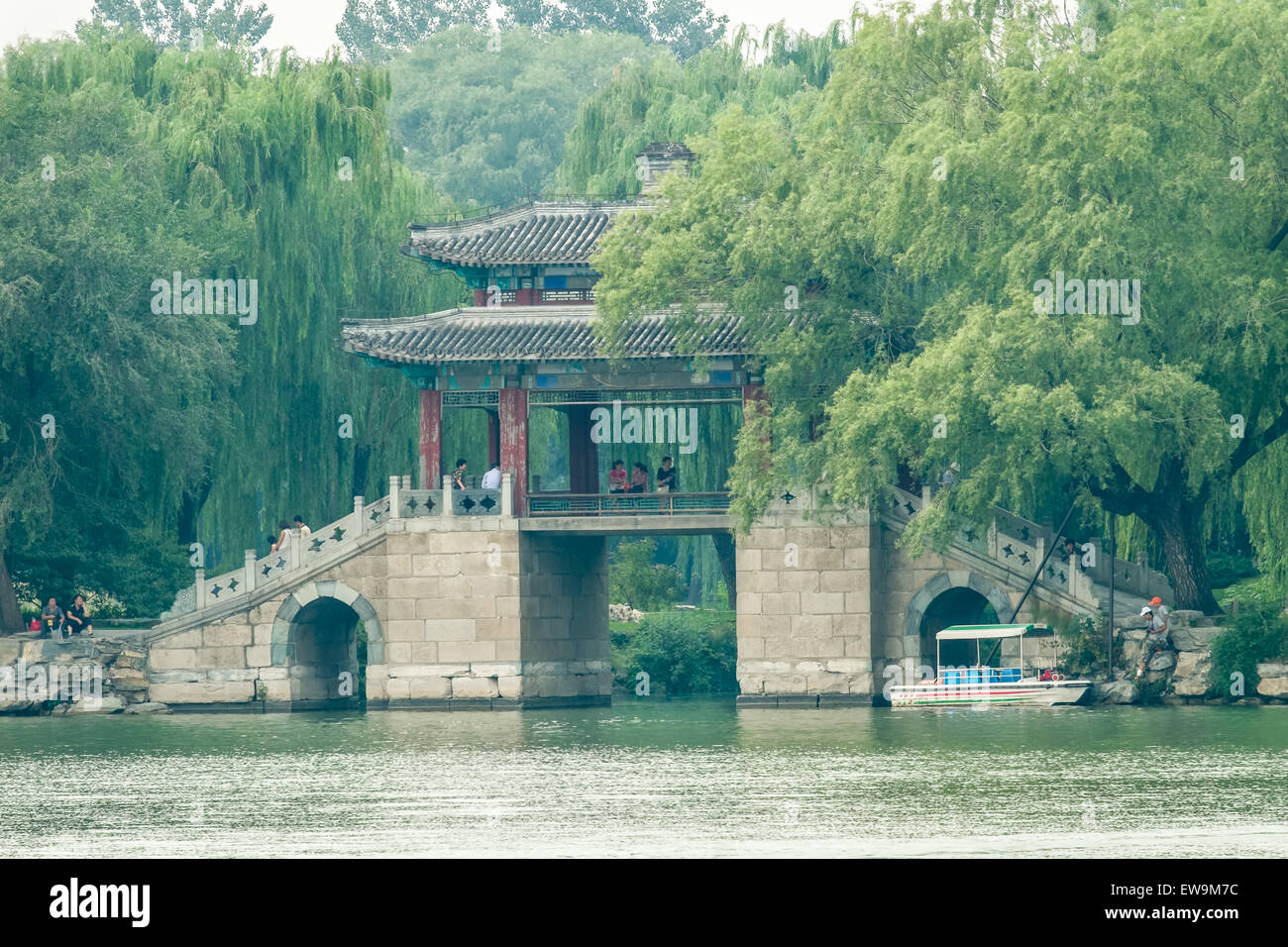 Bridge of Pastoral Poems surrounded by weeping willows at Kunming Lake ...