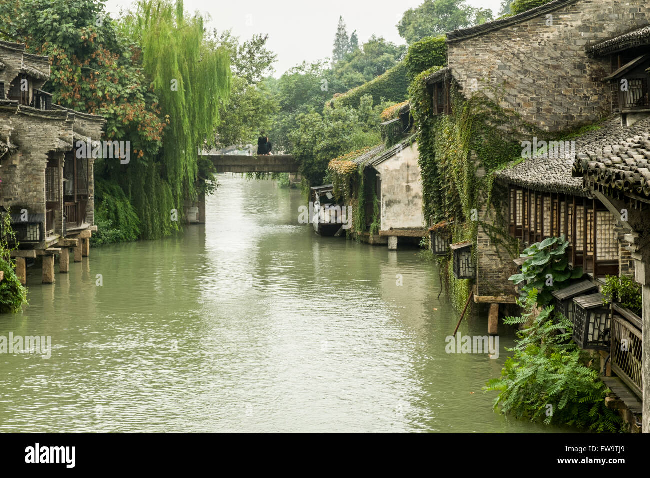 Traditional Chinese houses, canal and stone bridge in the historic ...