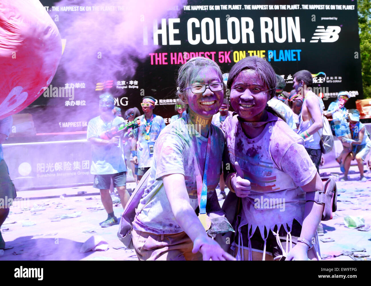 Beijing, China. 20th June, 2015. Runners take part in the 5km Color Run ...