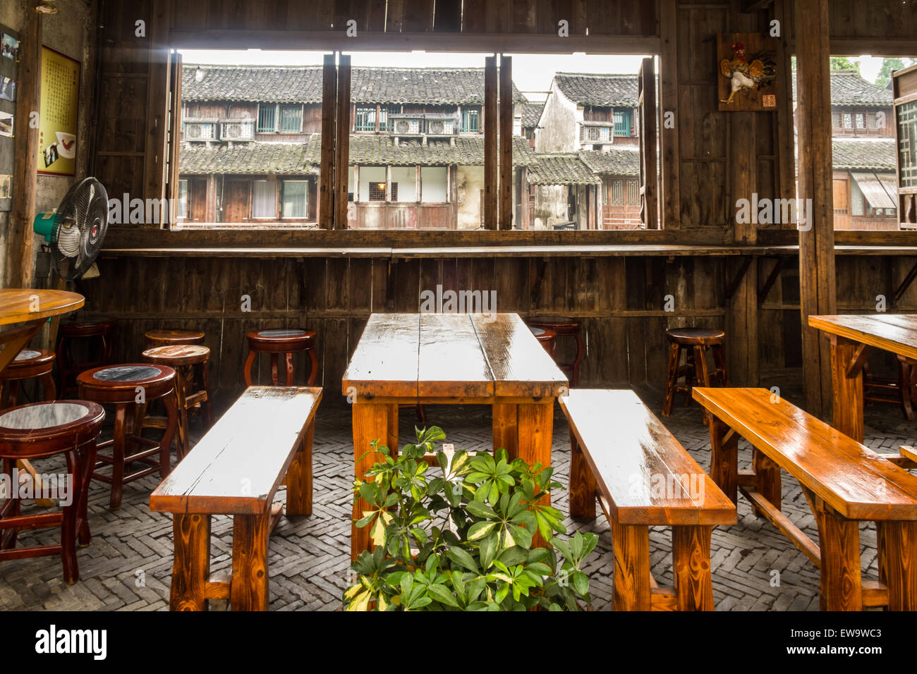 Wooden seating area inside restaurant Stock Photo - Alamy