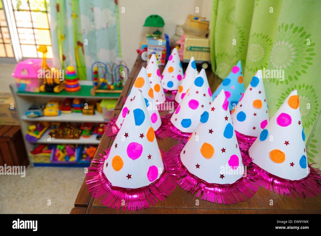 Children hand made party hats at Kindergarten art and handiwork corner ...