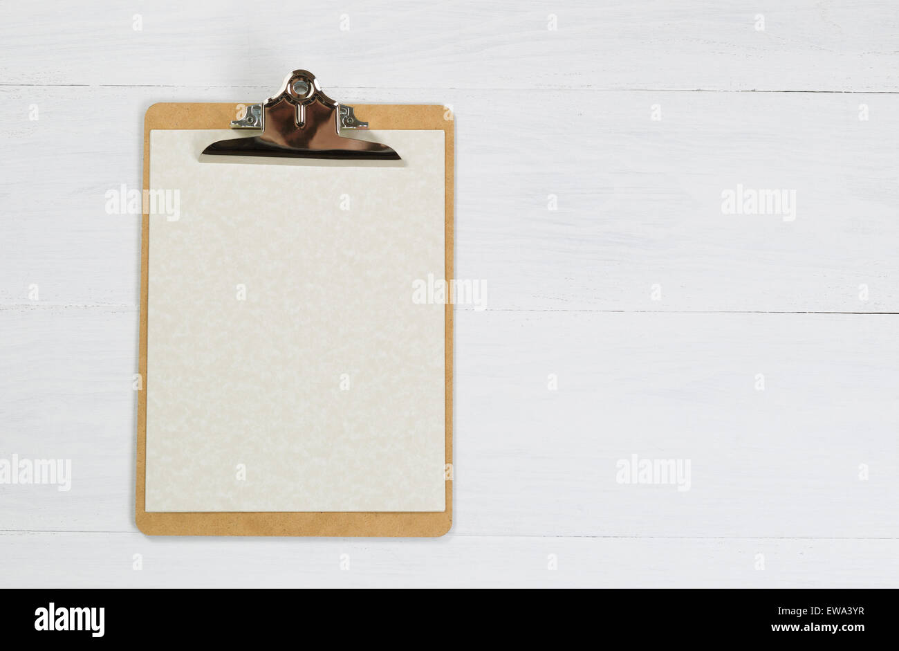 Blank clipboard with paper on white desktop Stock Photo - Alamy