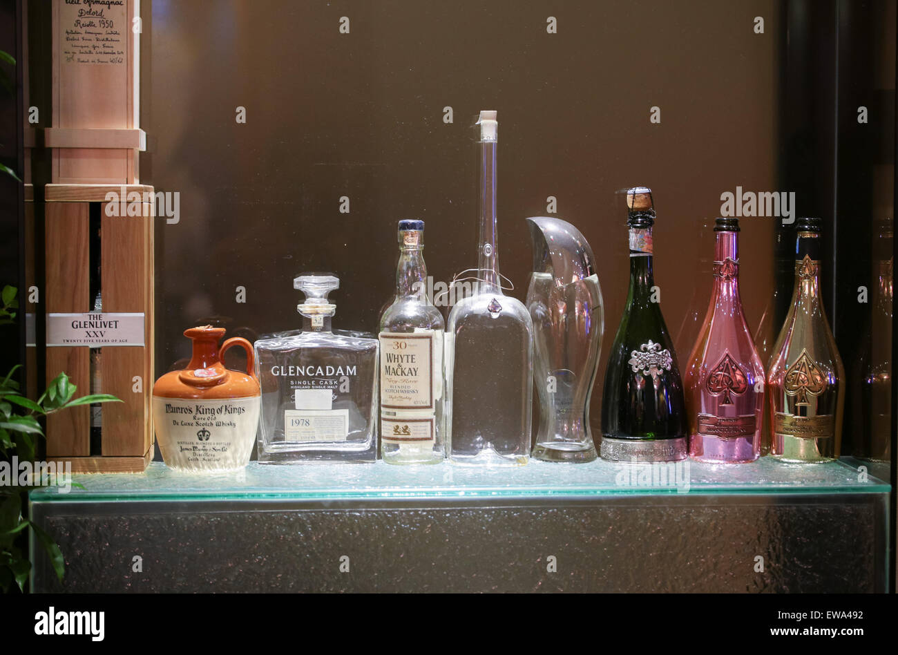 Stylish liquor bottles display Stock Photo - Alamy