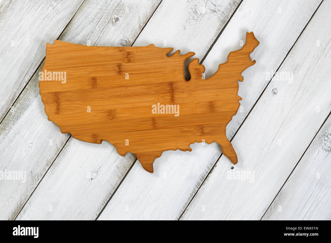 Wooden shape of United of America with rustic white wood underneath ...