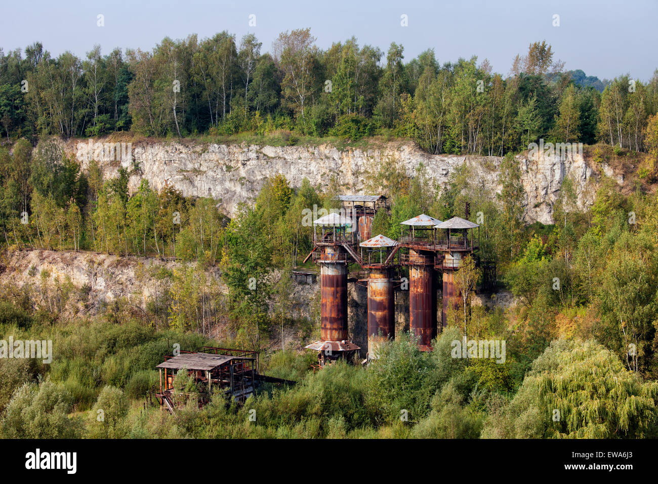 Abandoned Liban Quarry with Jurassic limestone cliffs and old, rusty ...