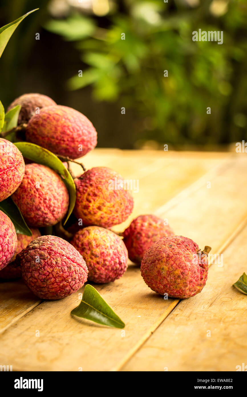 Lychee, red, floor boards, flooring, background, texture, fruit Stock ...