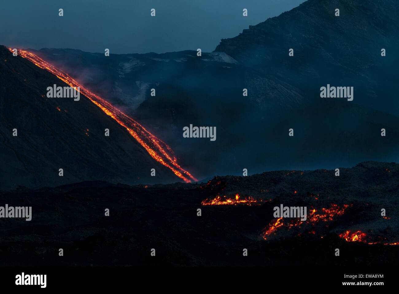 Lava flow of night Stock Photo - Alamy