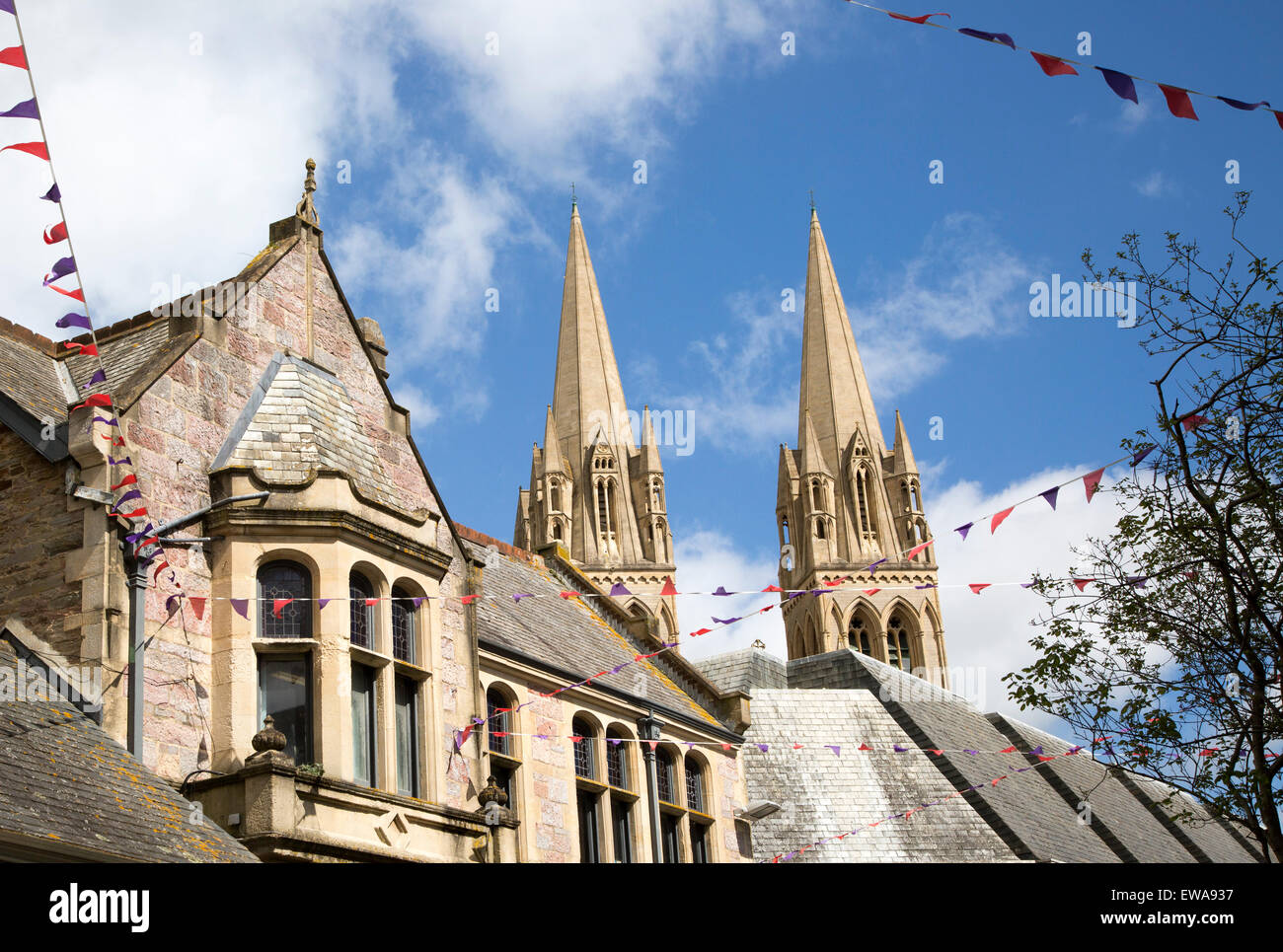 Spires of cathedral rise above historic town centre buildings, Truro ...