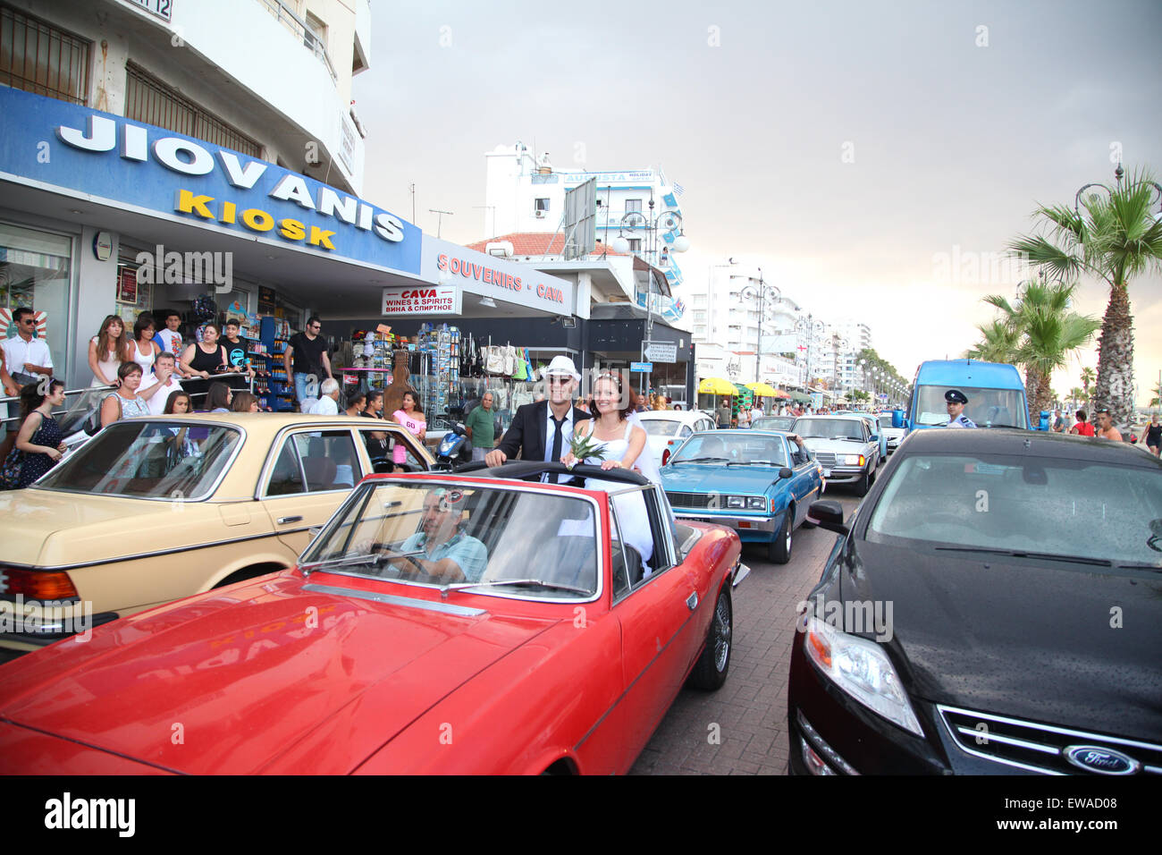 Larnaca, Cyprus. 19th June, 2015. The couple ride on a vintage car in ...