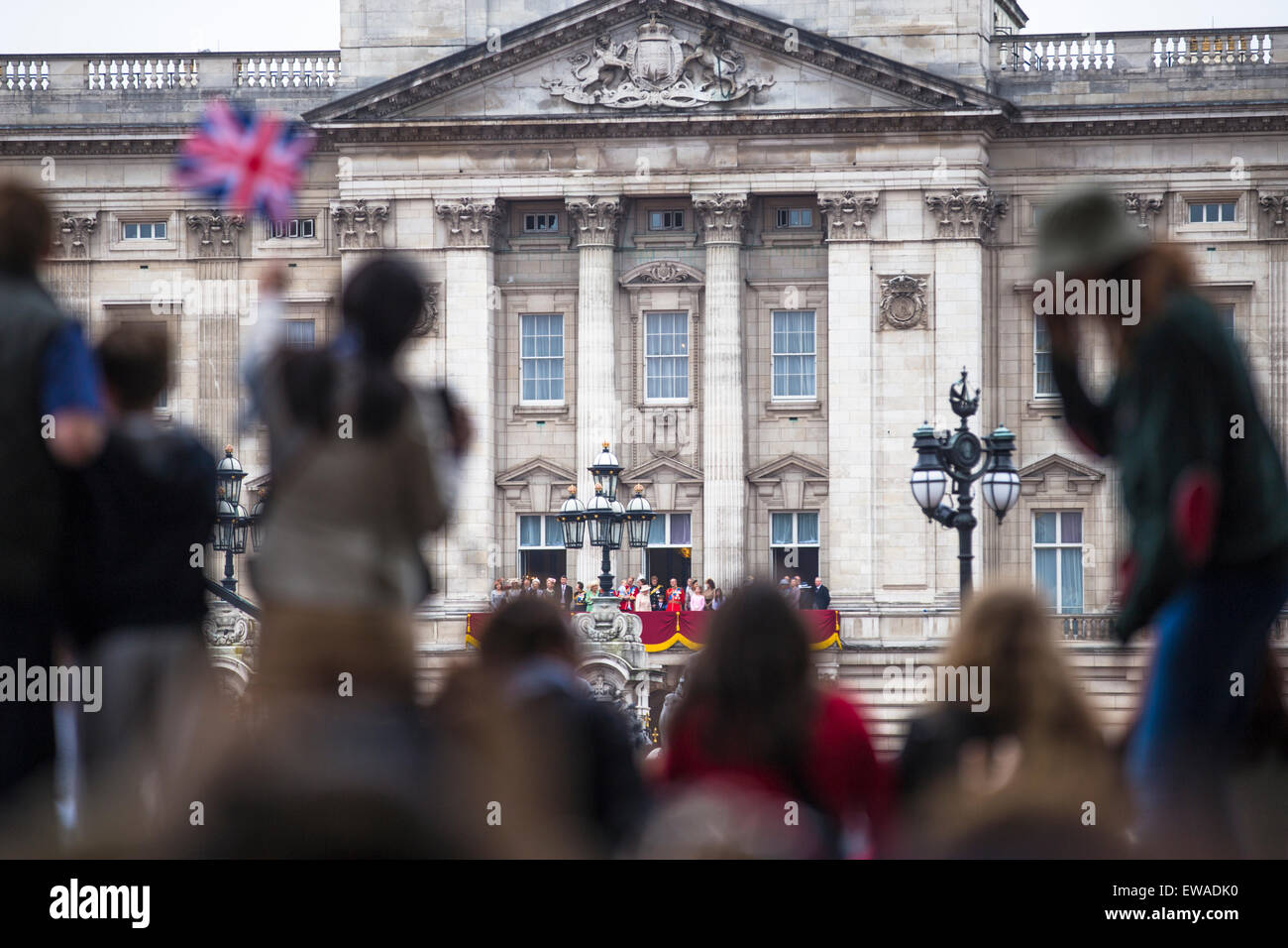 Crowds gather as Queen Elizabeth II and other members of the Royal ...