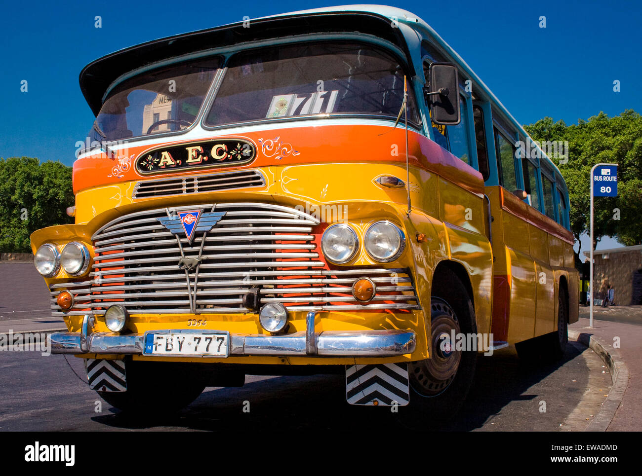 Front view of Maltese colourful yellow and orange buses, now ...
