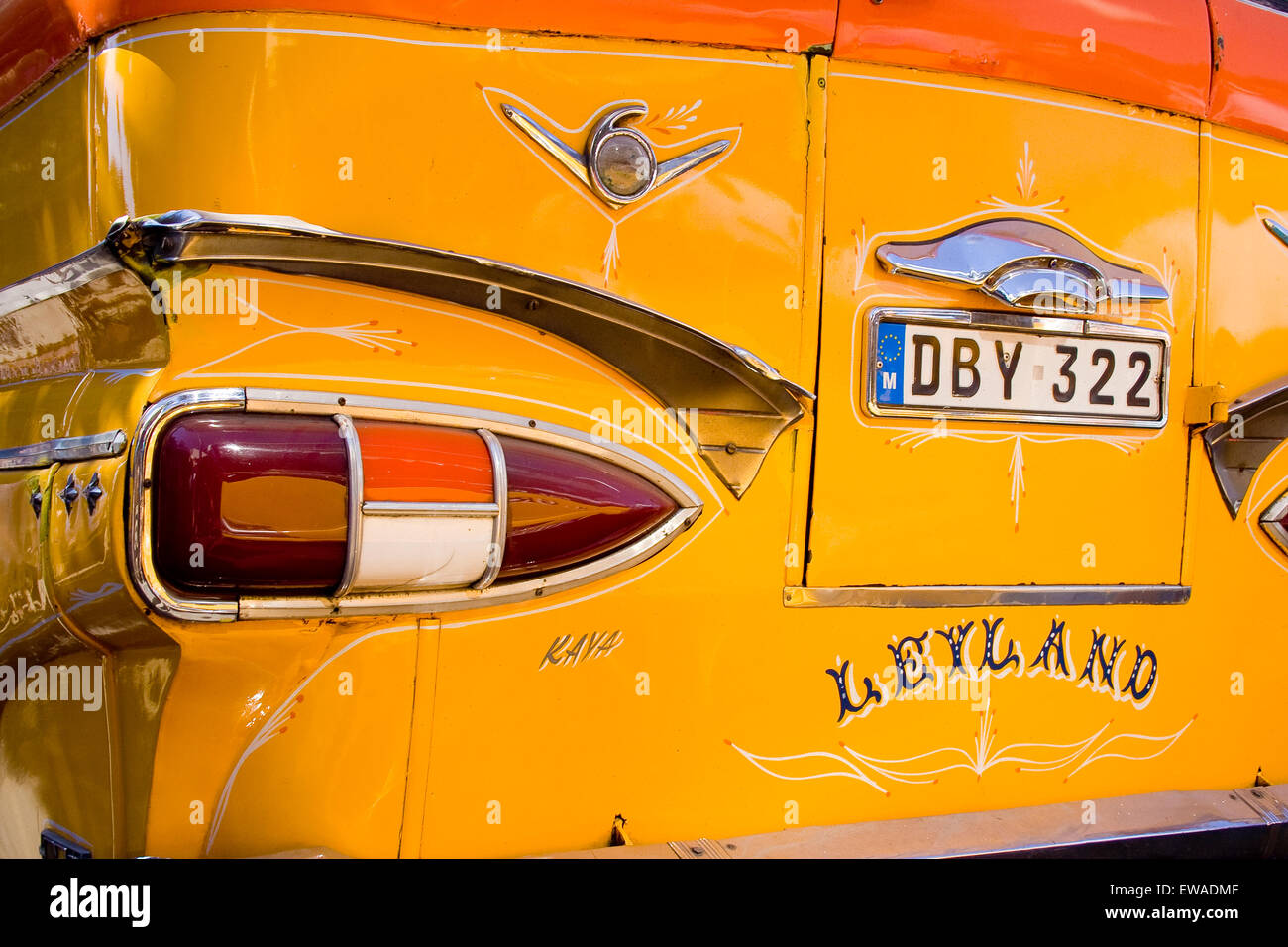 Rear view of Maltese colourful yellow and orange buses, now ...