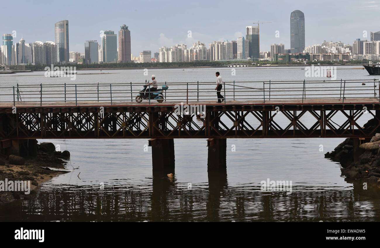 Haikou, China's Hainan Province. 21st June, 2015. Ships berth at ...
