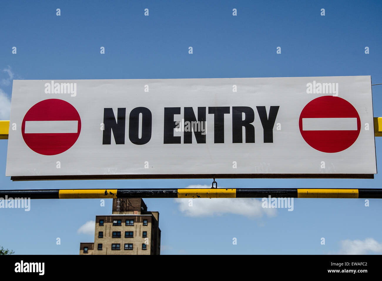 A no entry sign with two graphics and height gauge Stock Photo - Alamy