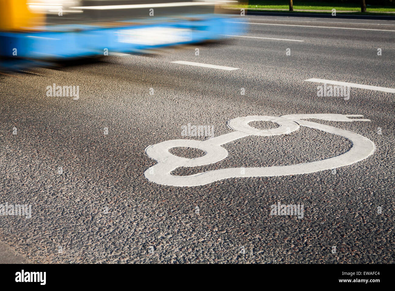 Electric car sign on the road with public transport runs in the ...