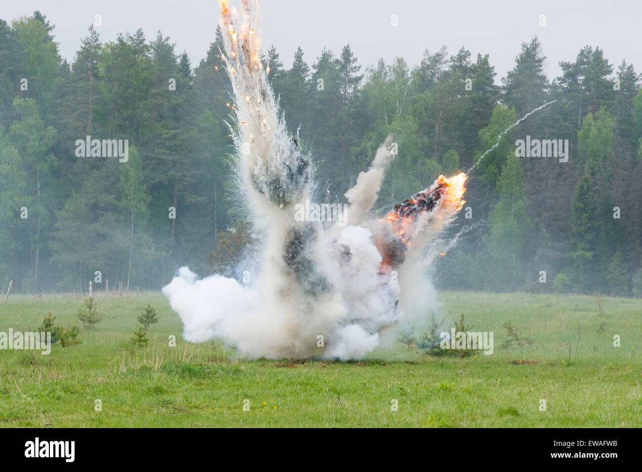 Image of explosion on field during military actions Stock Photo - Alamy