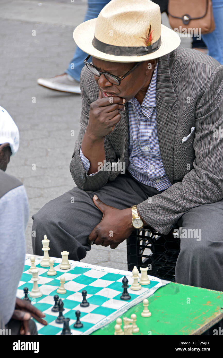 Middle game player thinks hi-res stock photography and images - Alamy