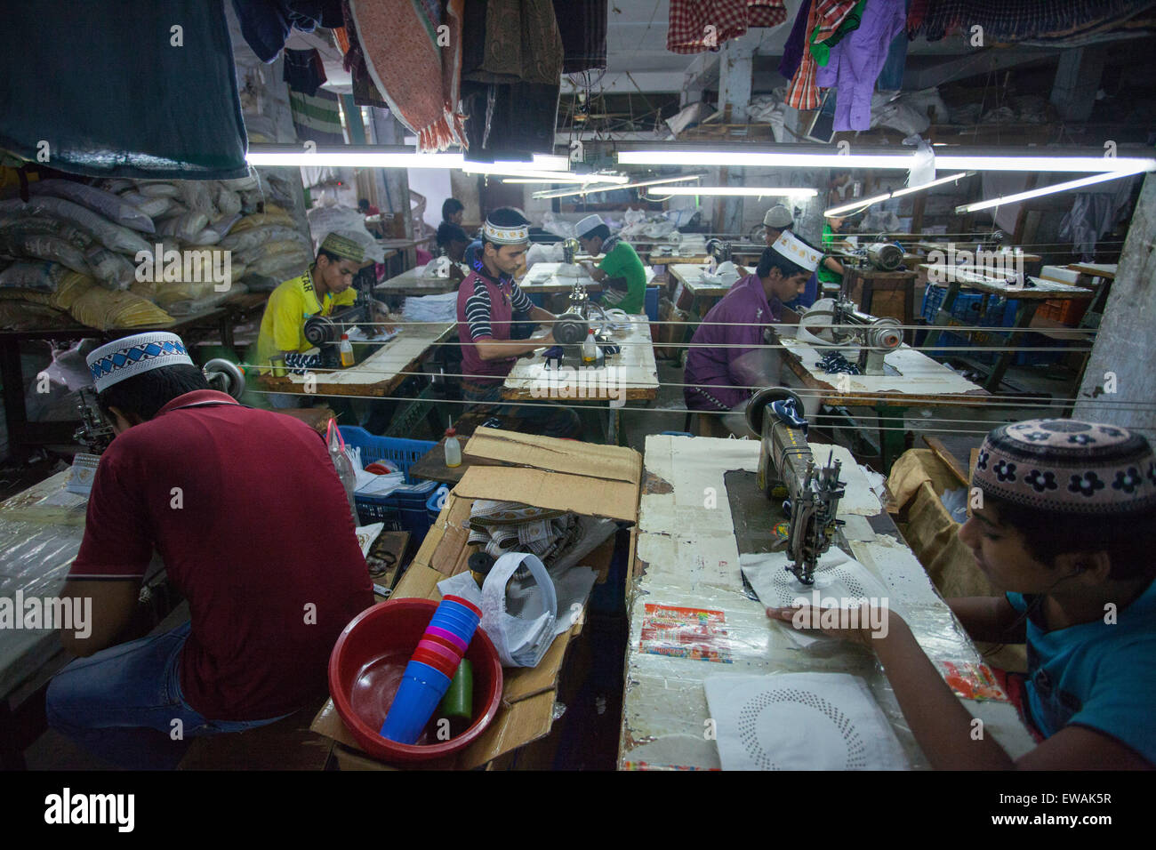 DHAKA, BANGLADESH 21st June : worker is busy at a factory in old Dhaka ...