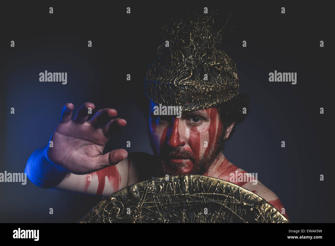 Soldier, bearded man warrior with metal helmet and shield, wild Viking ...