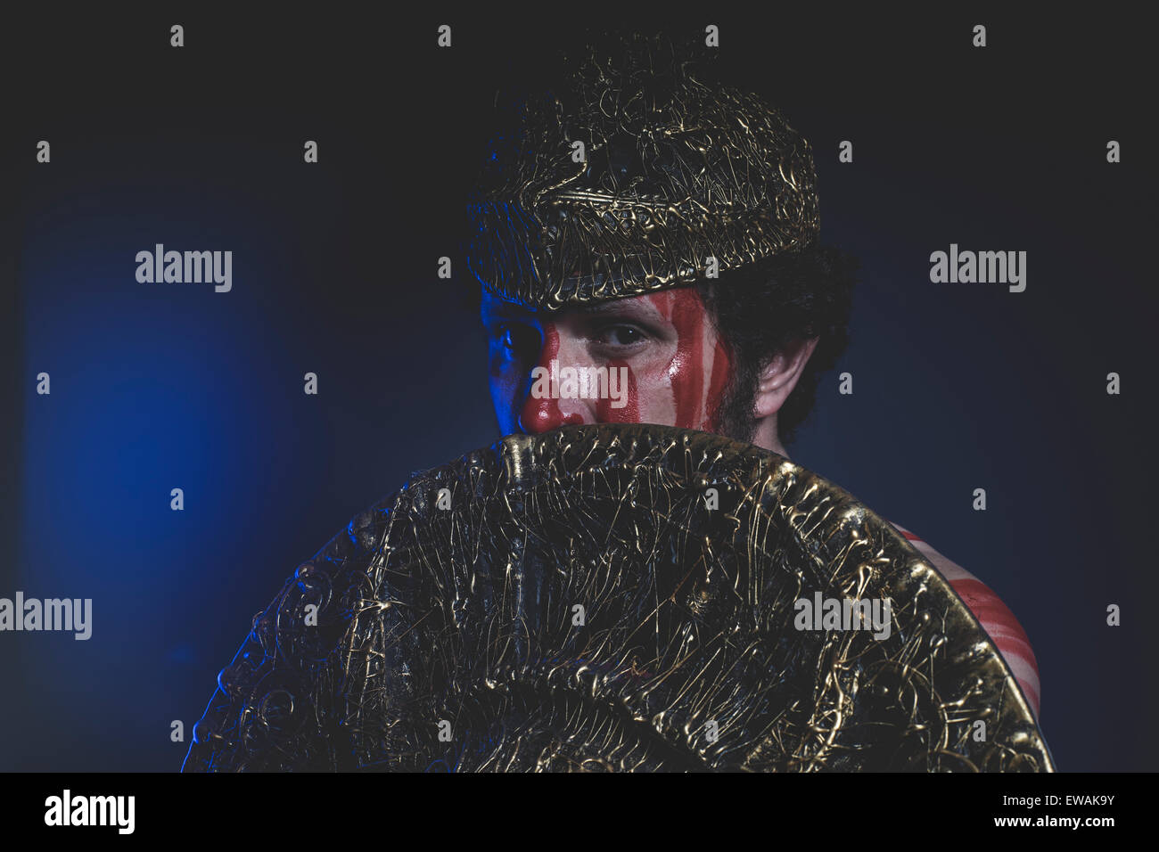 Medieval, bearded man warrior with metal helmet and shield, wild Viking ...
