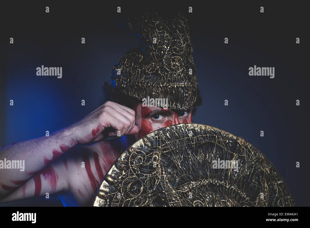 bearded man warrior with metal helmet and shield, wild Viking Stock ...