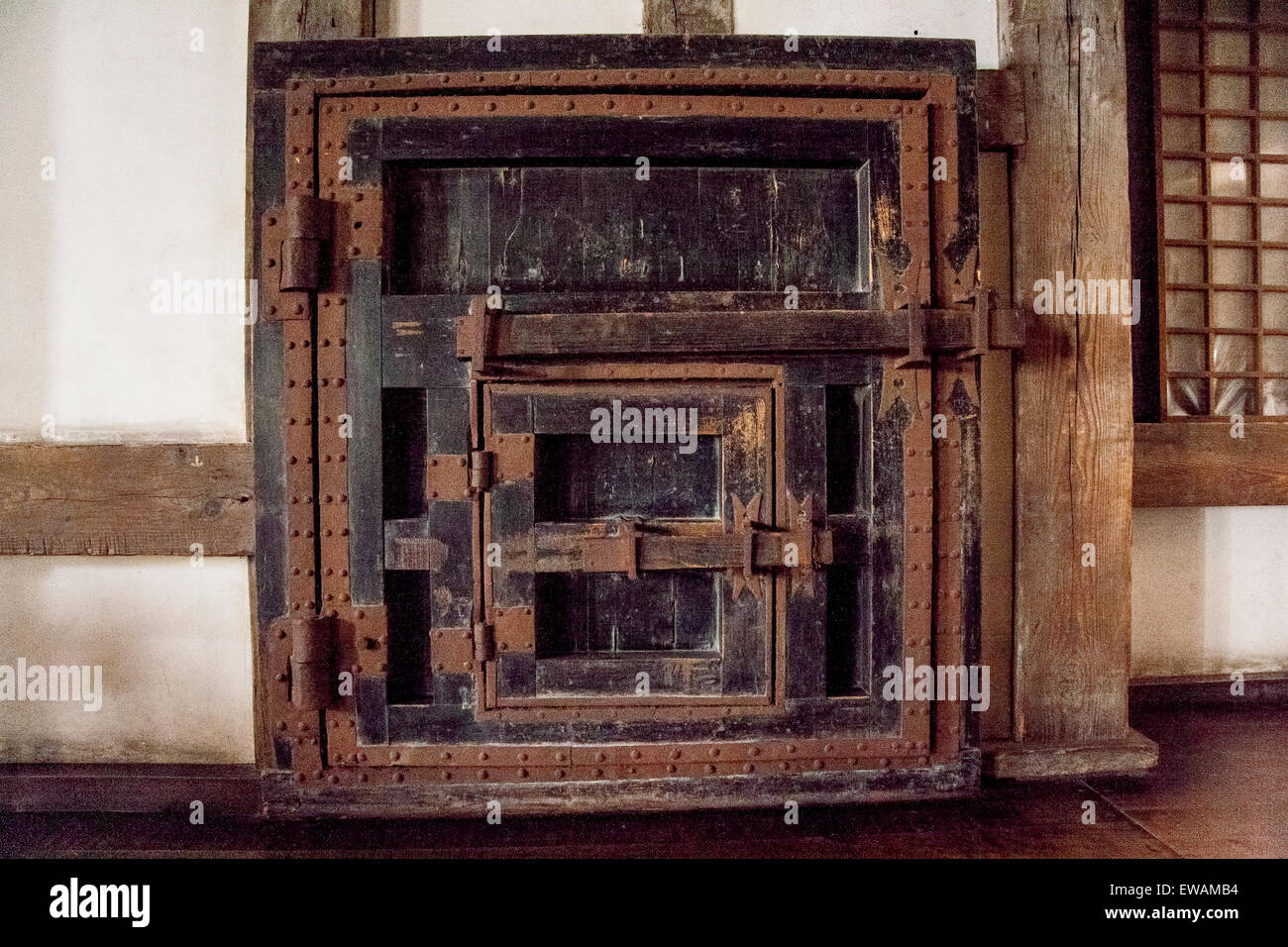 Himeji castle keep interior. A door featuring two locks to enable ...