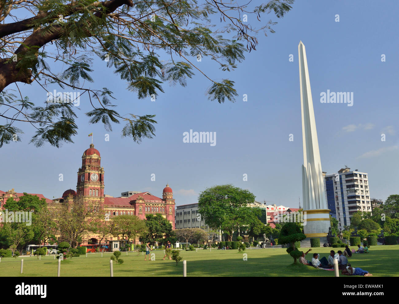 The Independence Monument in Maha Bandula Park together with the former ...
