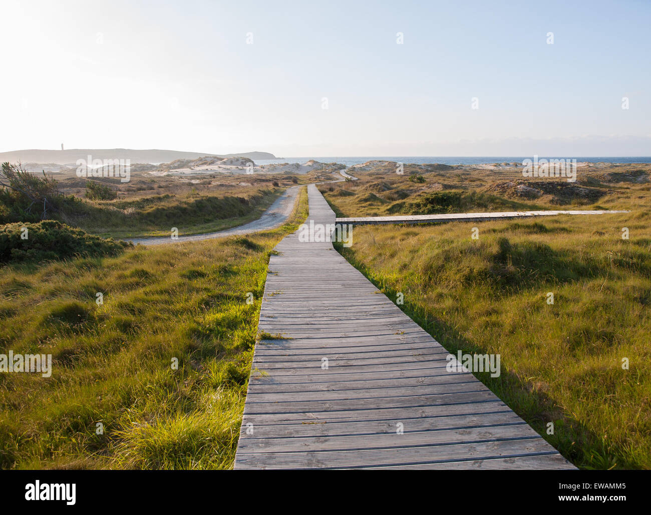 Boardwalk on the beach in a sunny day Stock Photo - Alamy