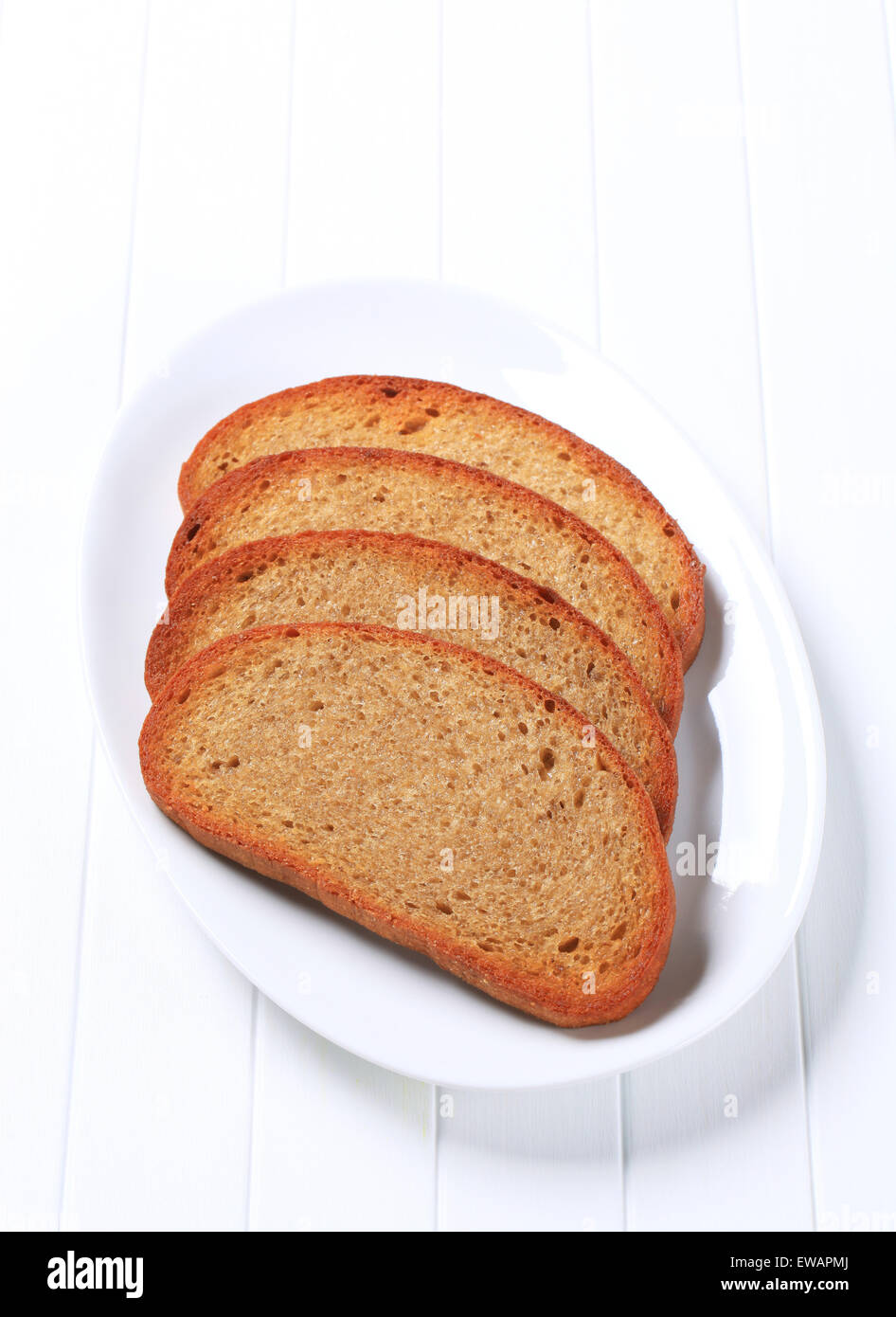 Pan fried slices of continental bread Stock Photo - Alamy