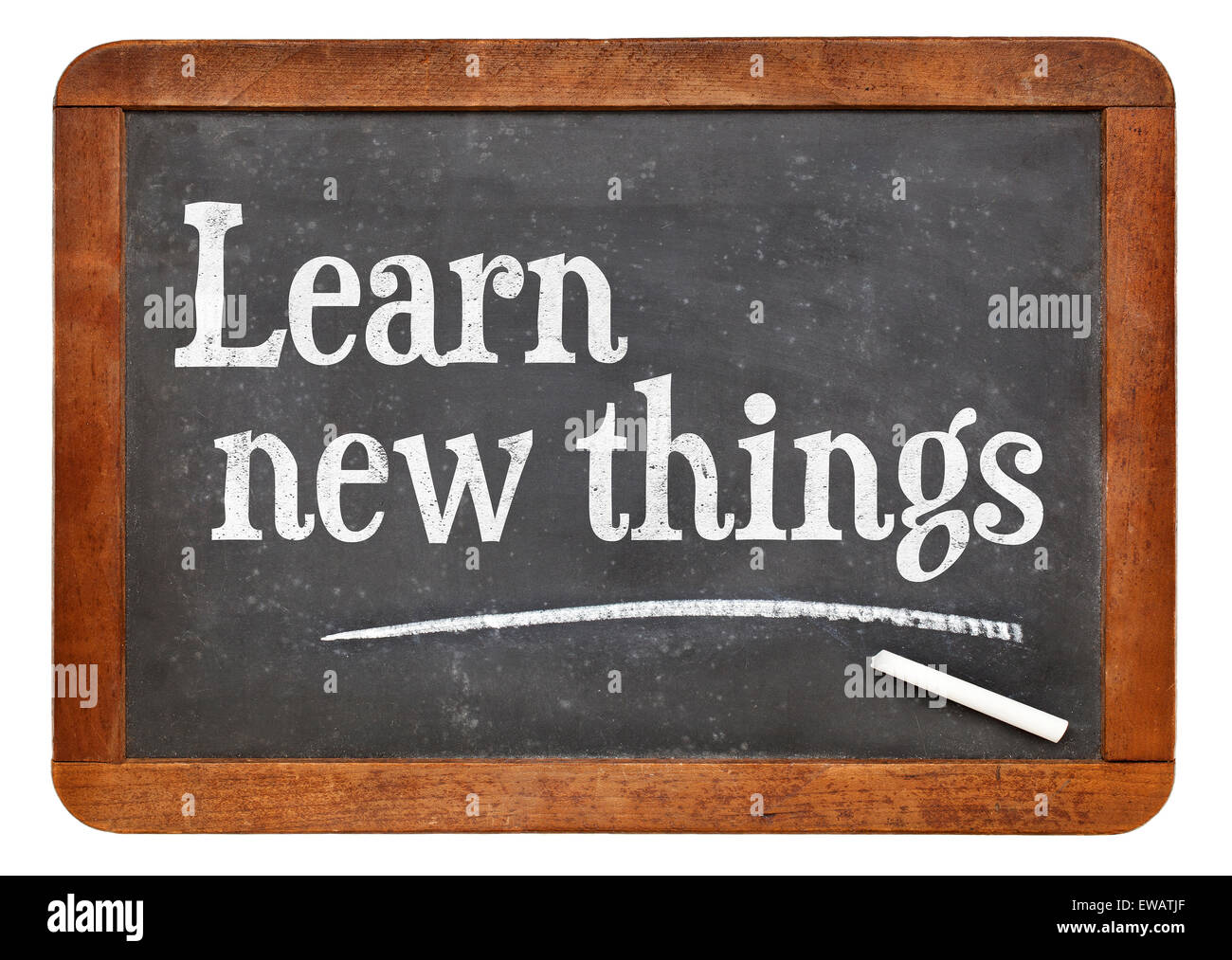 Learn new things - motivational text on an isolated vintage slate ...