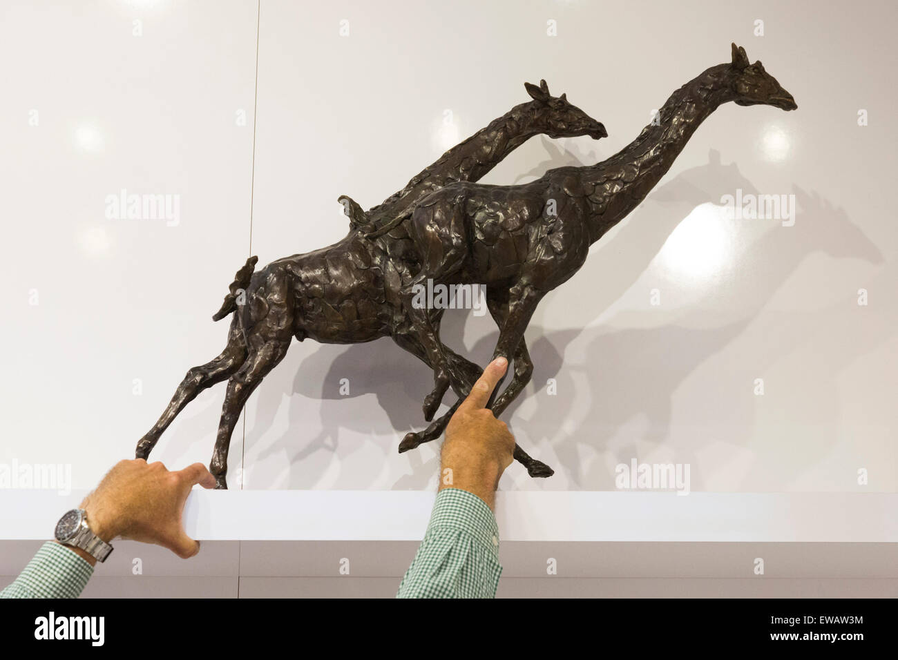 London, UK. 20 June 2015. Sculptor Mark Coreth makes final preparations ...