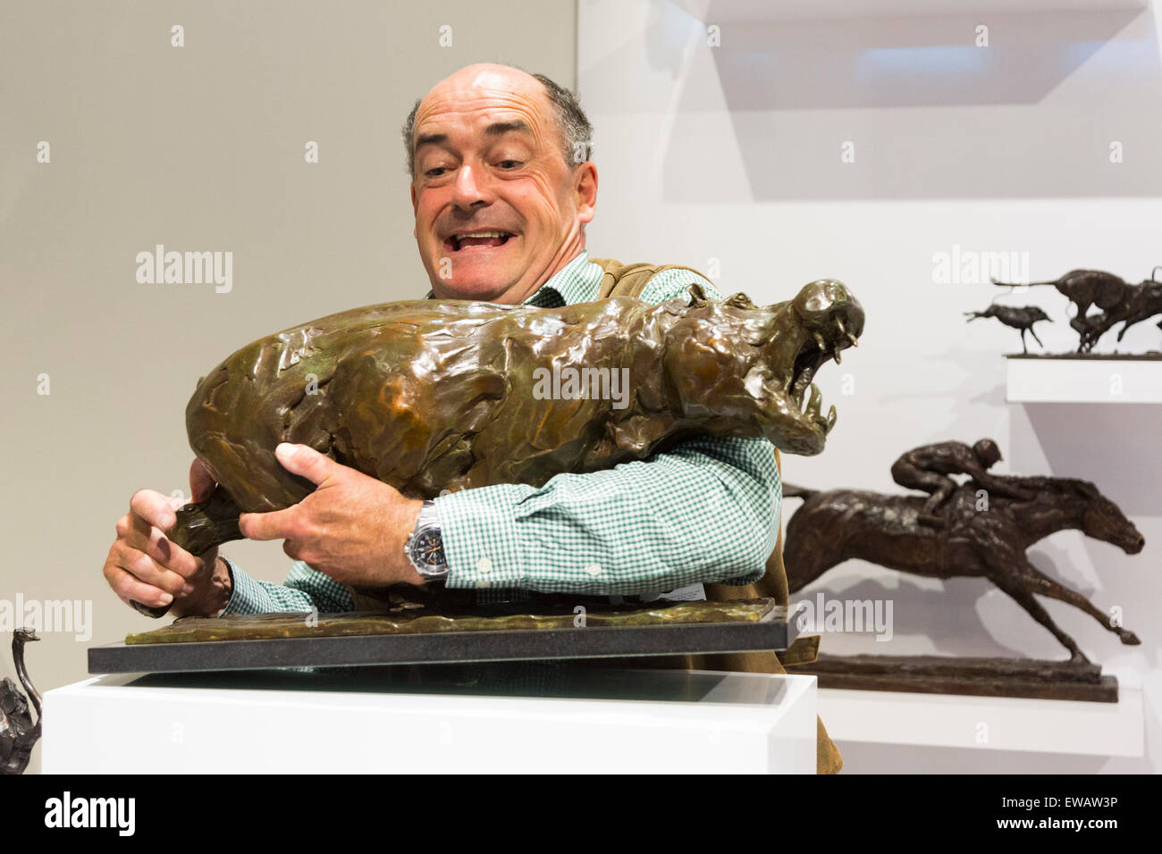 London, UK. 20 June 2015. Sculptor Mark Coreth makes final preparations ...