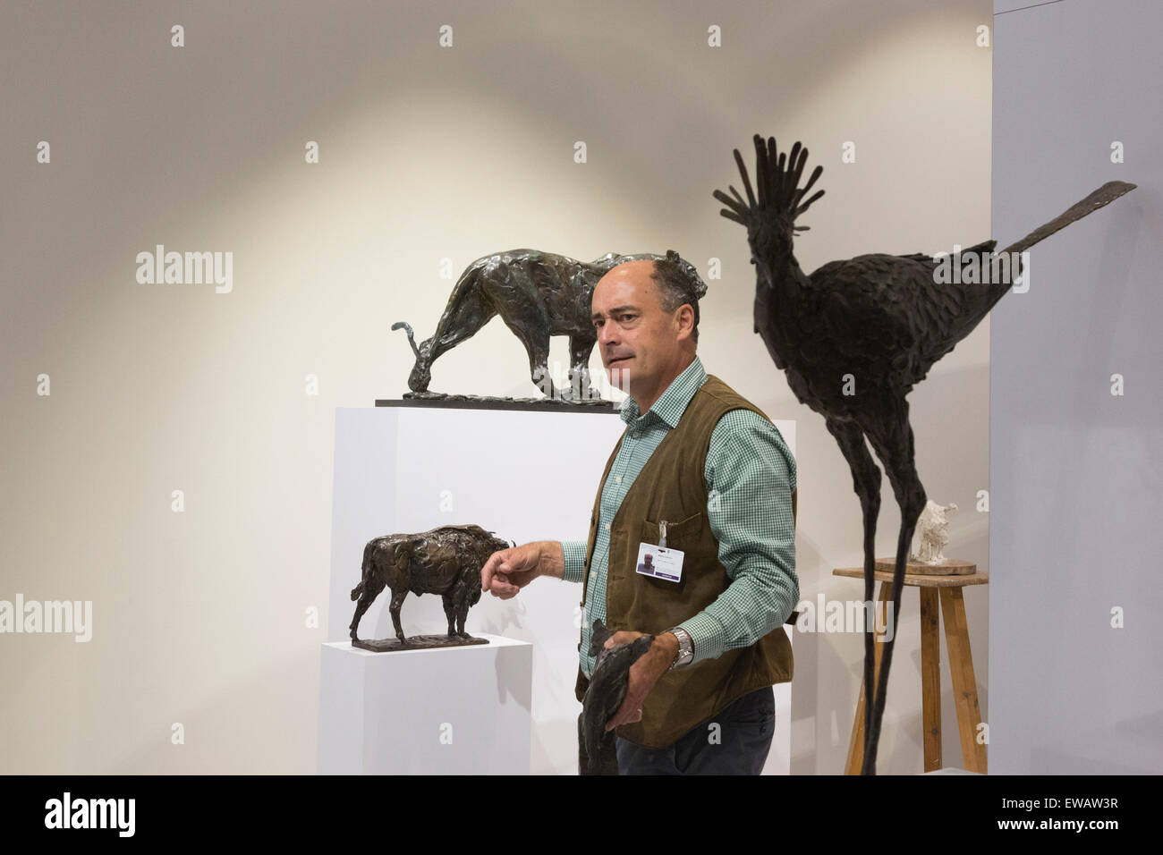 London, UK. 20 June 2015. Sculptor Mark Coreth makes final preparations ...