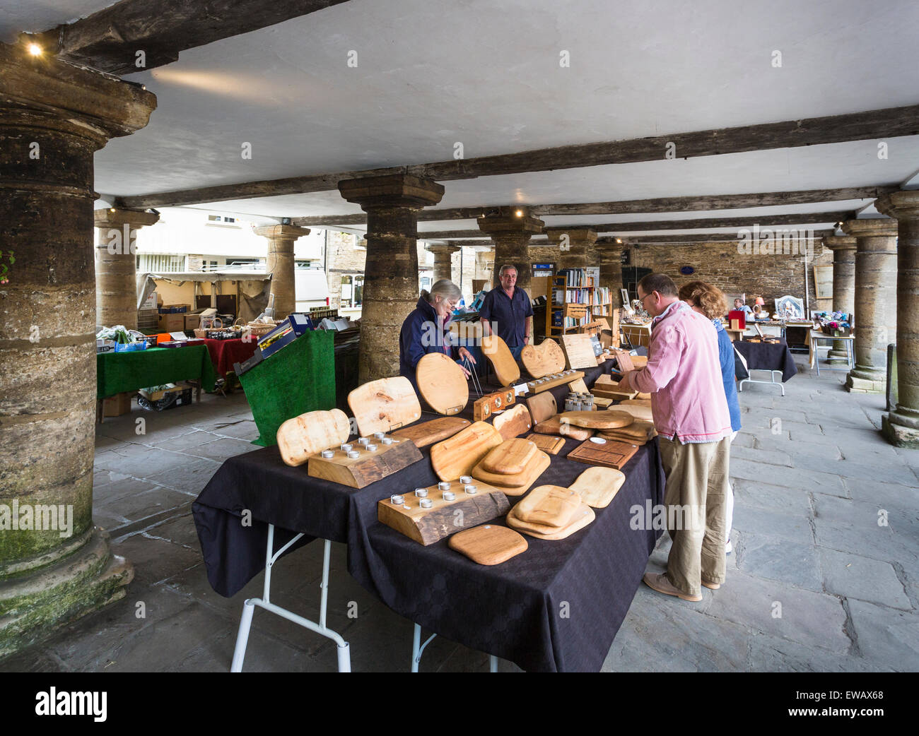 Craft stall selling wooden products in the pillared Market House ...