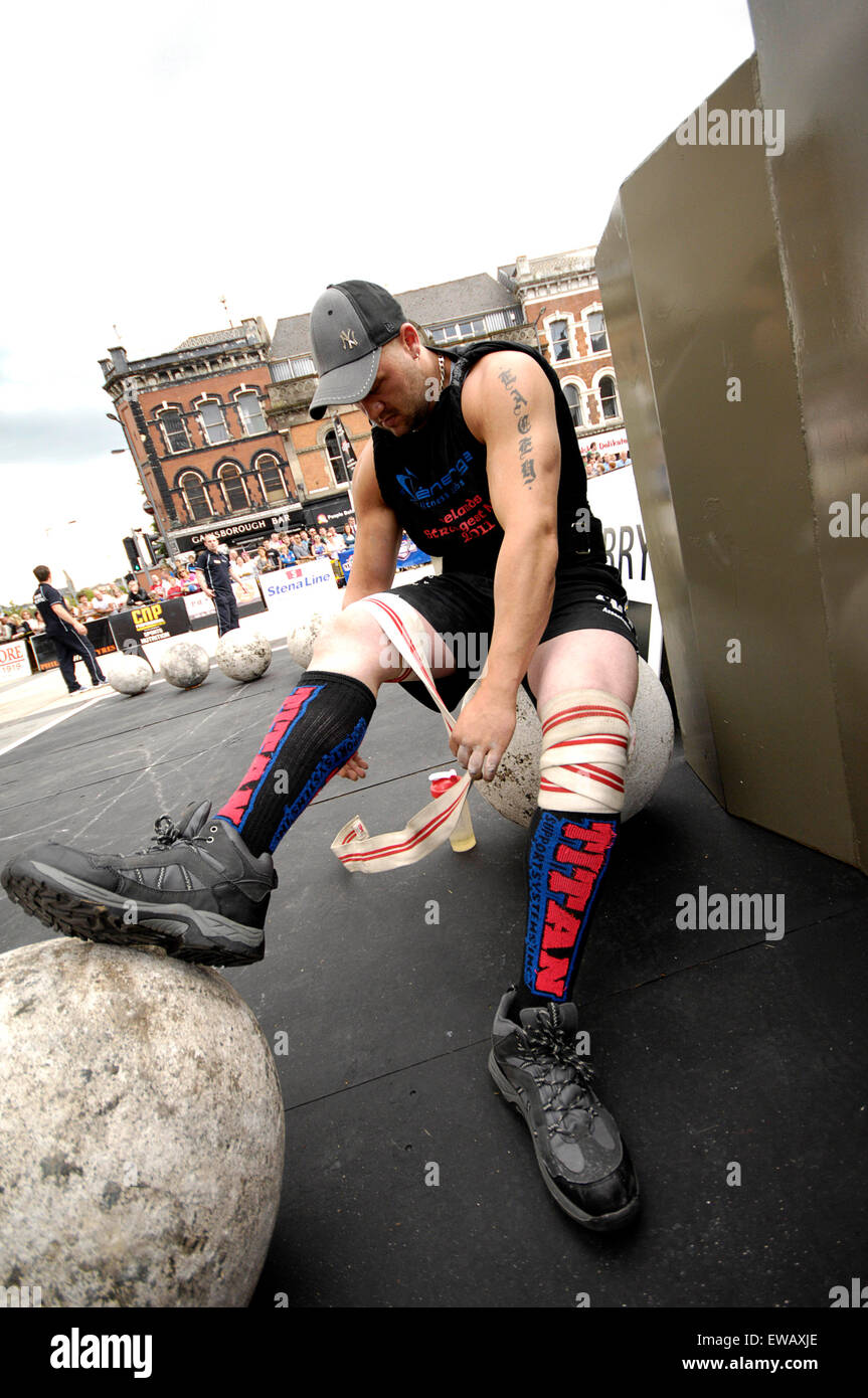 Competitor applying strapping to his knees during the Ireland's ...
