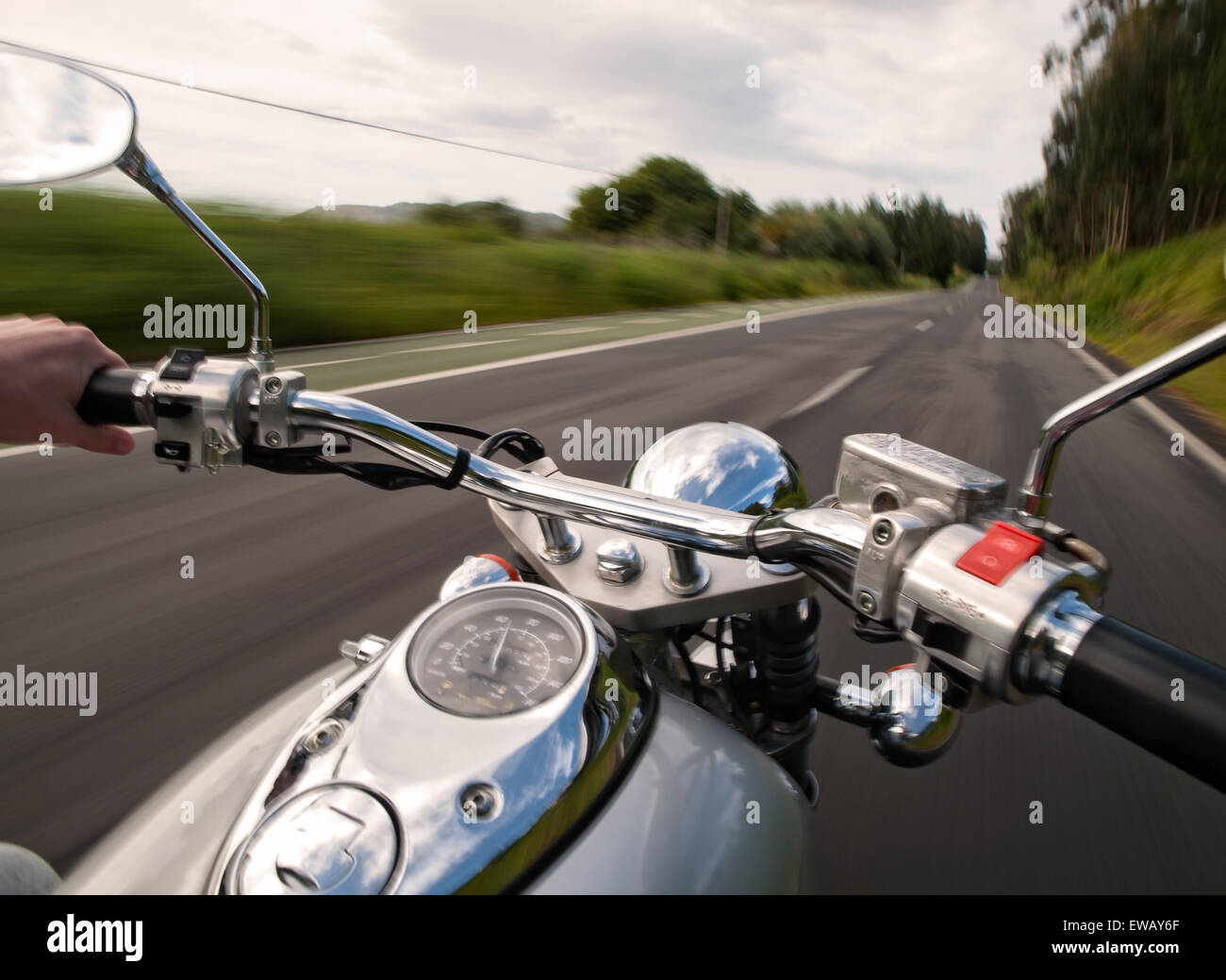 Driving a motorcycle on the road Stock Photo - Alamy