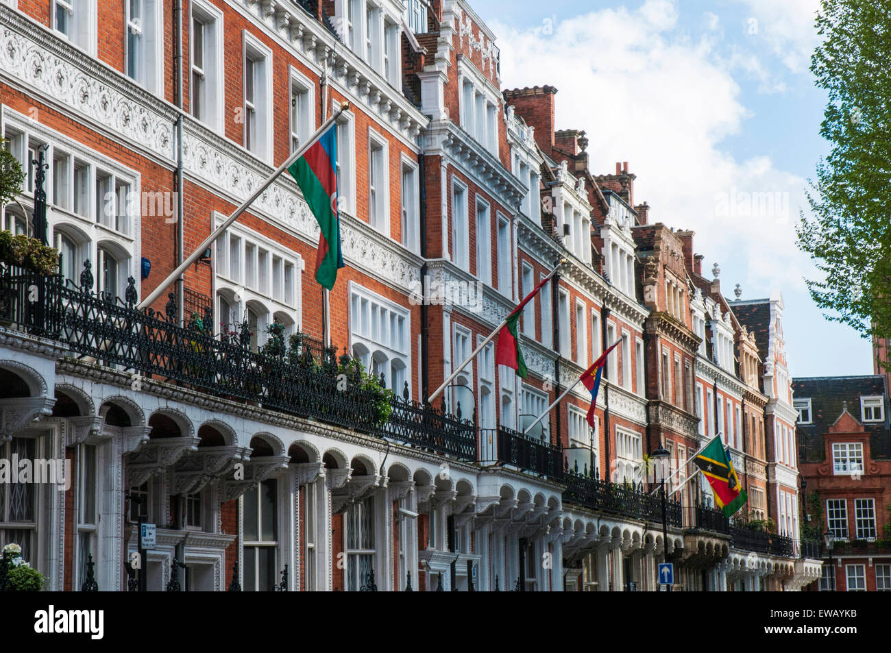 A row of foreign diplomatic missions side-by-side in Kensington, London ...