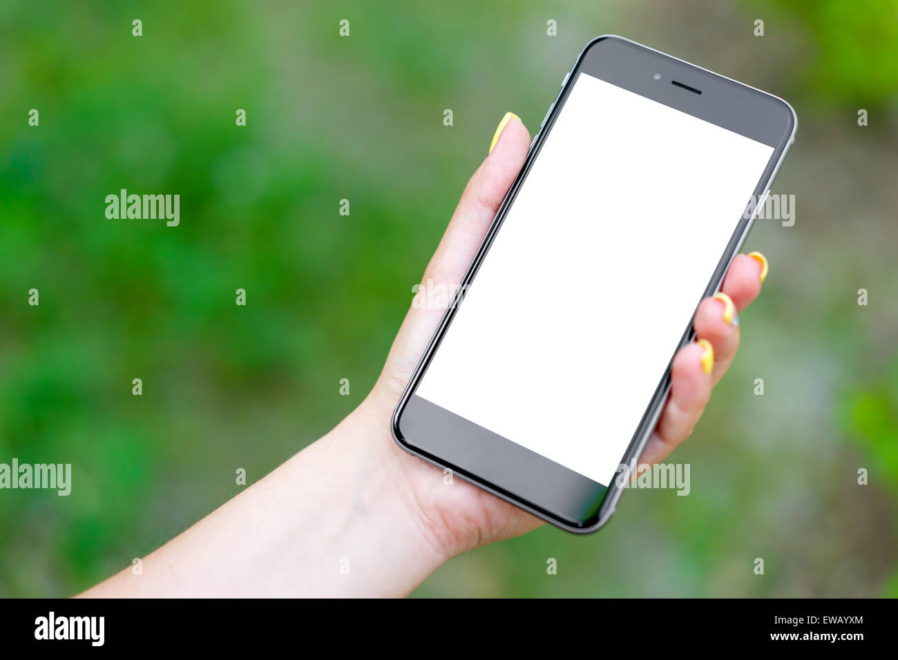 A large cell phone in hand, isolated white display Stock Photo - Alamy