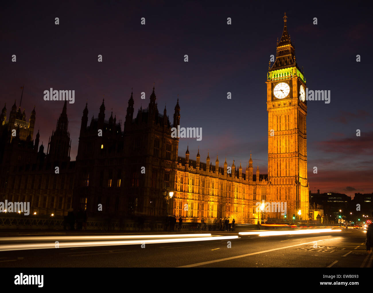 A view of the Houses of Parliament in London at Dusk. The blur of ...