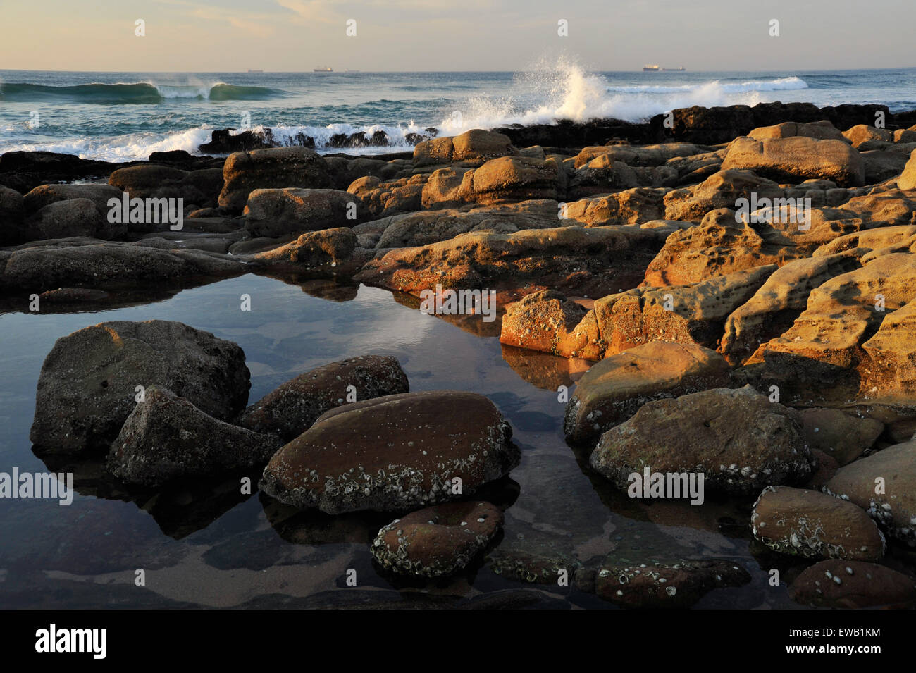 Durban, KwaZulu-Natal, South Africa, waves breaking against rocky ...
